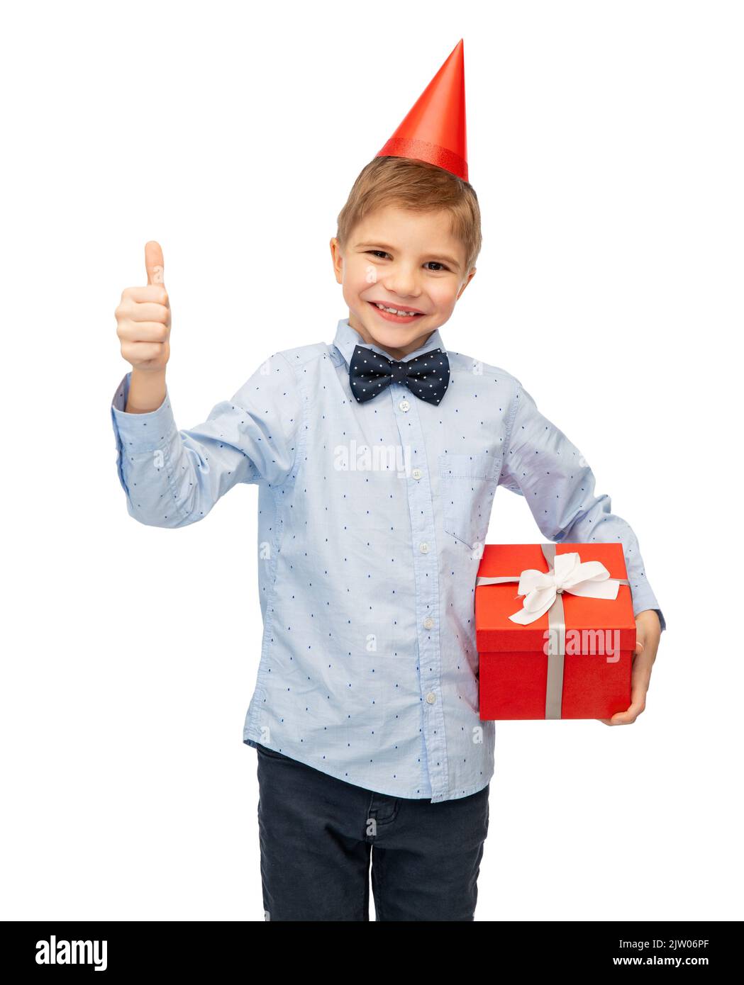 happy boy with birthday gift showing thumbs up Stock Photo - Alamy