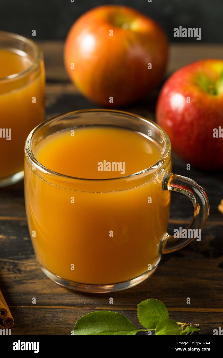 Organic Warm Apple Cider Cocktail in a Mug Stock Photo - Alamy