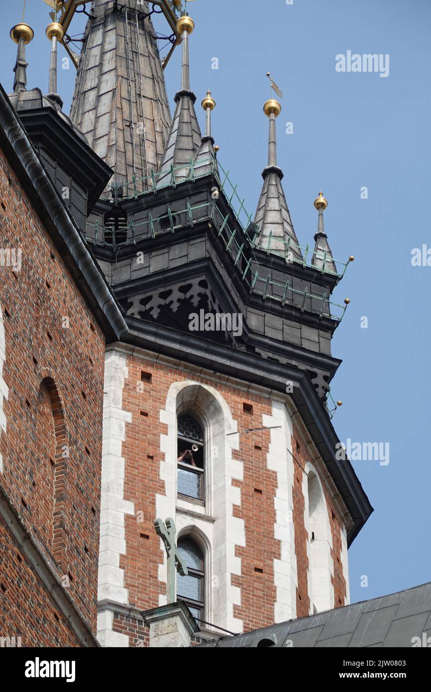Trumpeter playing the hourly St Mary's Trumpet Call, Hejnal mariacki ...