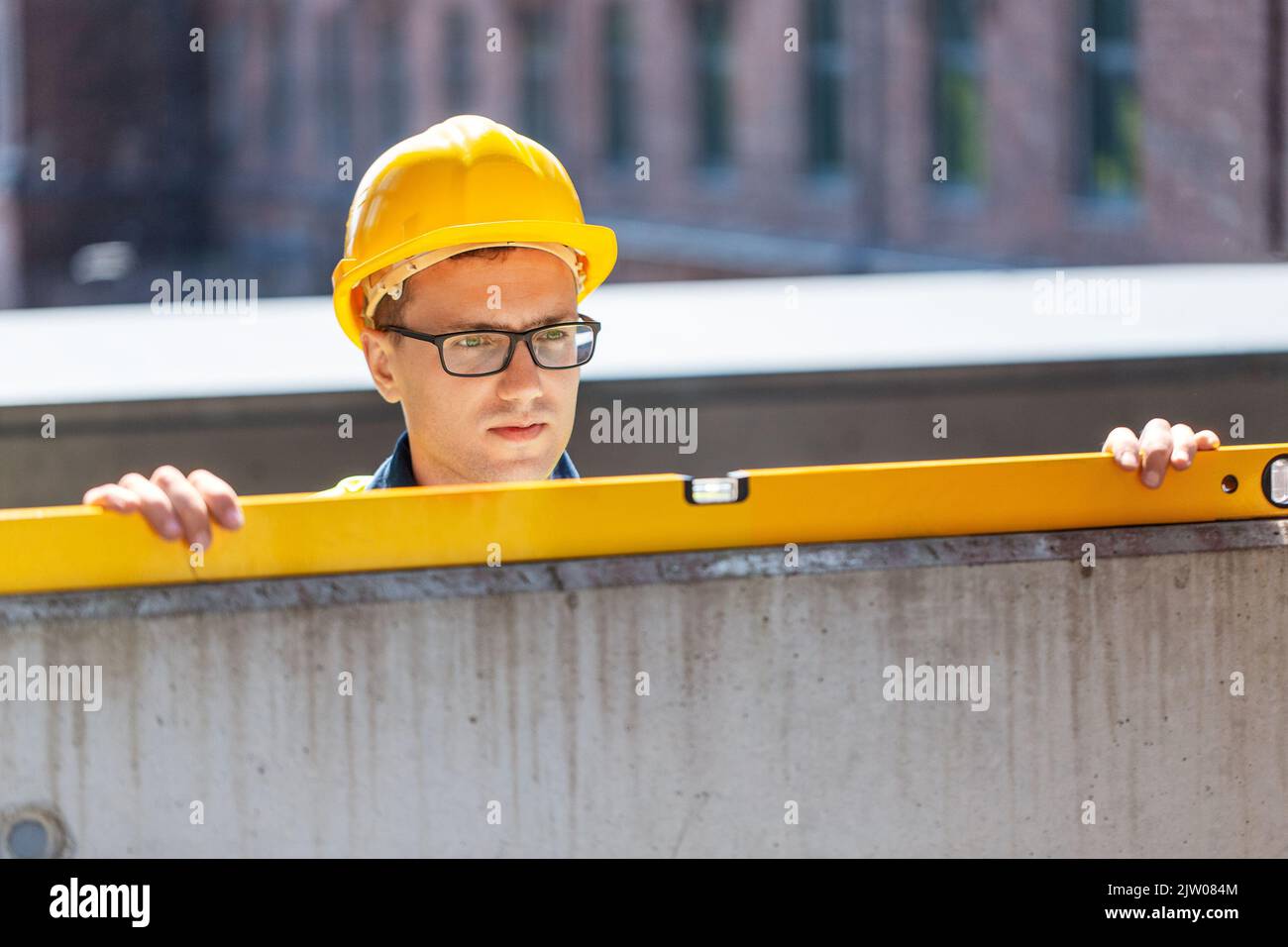 Builder man level hi-res stock photography and images - Alamy