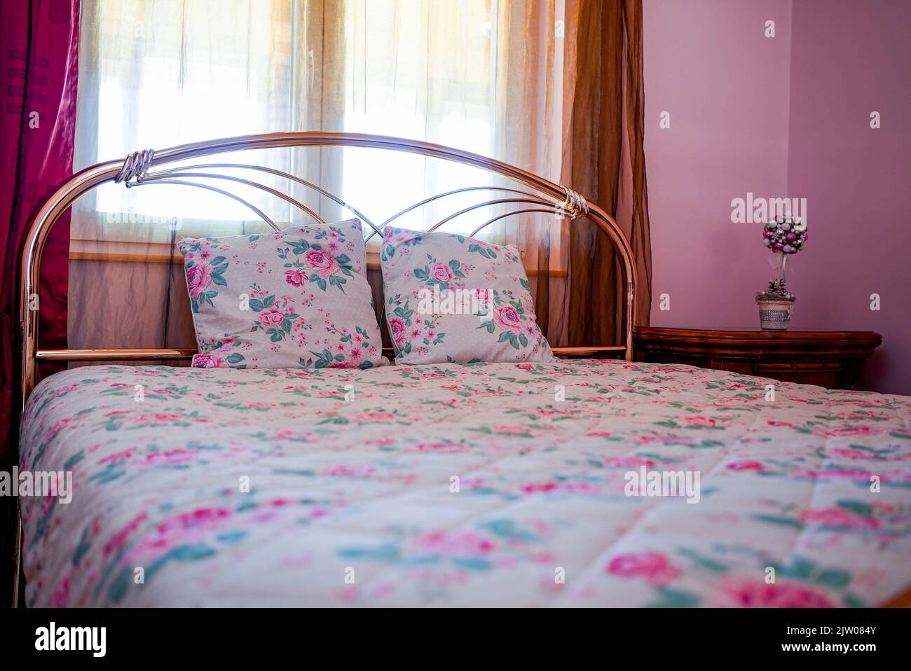 Bright pink bed frame hi-res stock photography and images - Alamy