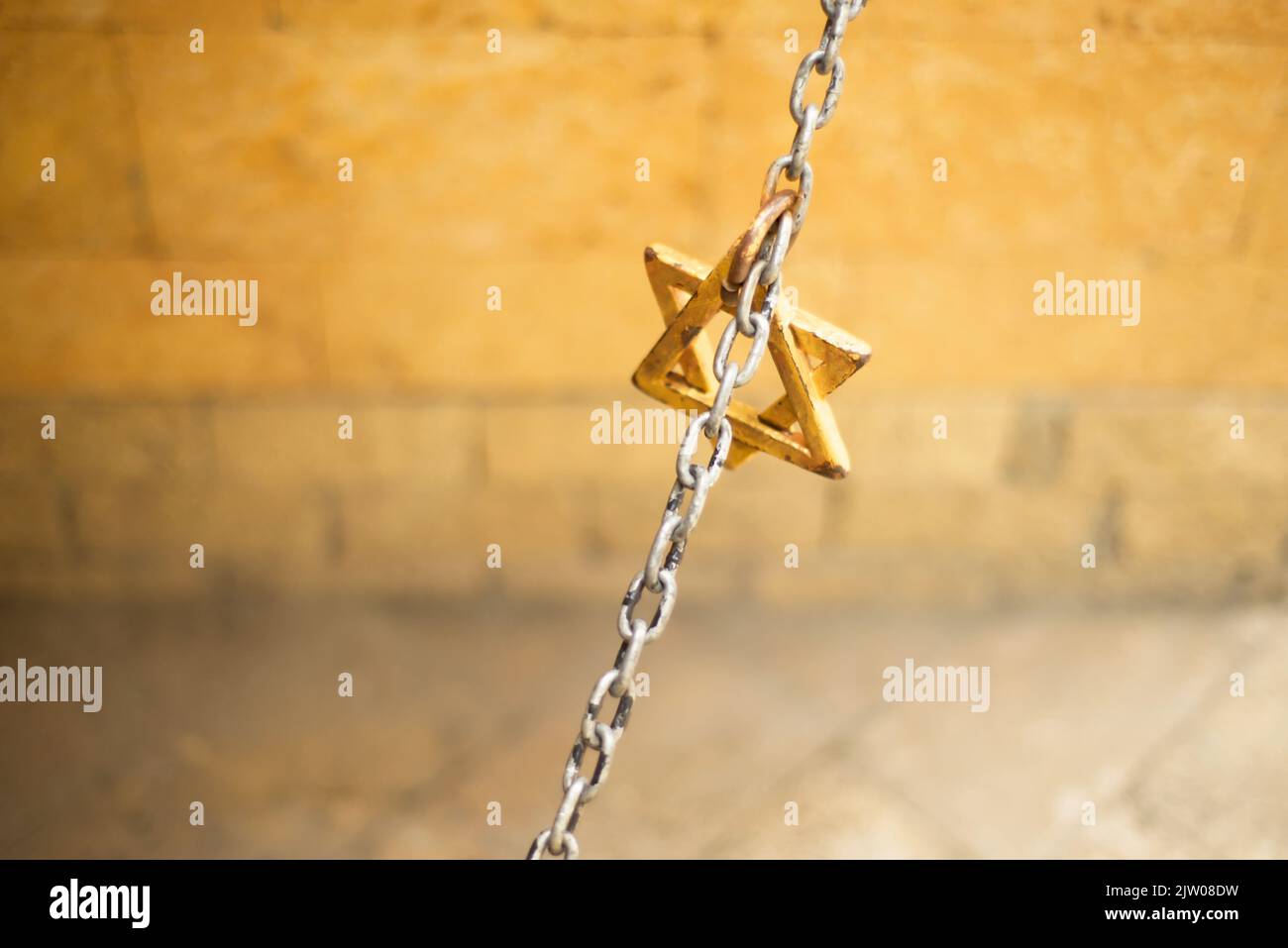 Star of David on a chain. Wall. Copy space for text. Religion Symbols ...