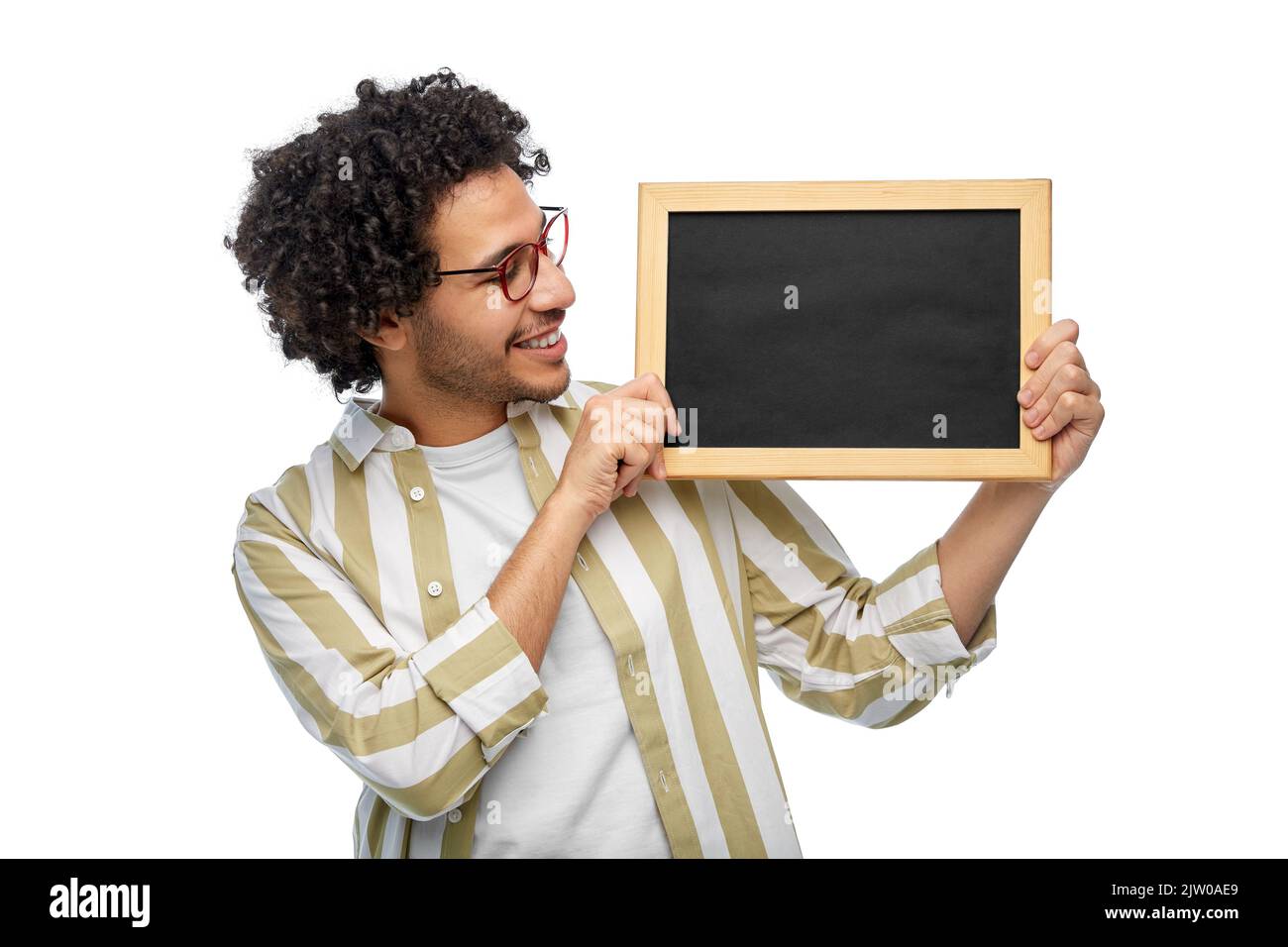 smiling man with chalkboard over white background Stock Photo - Alamy