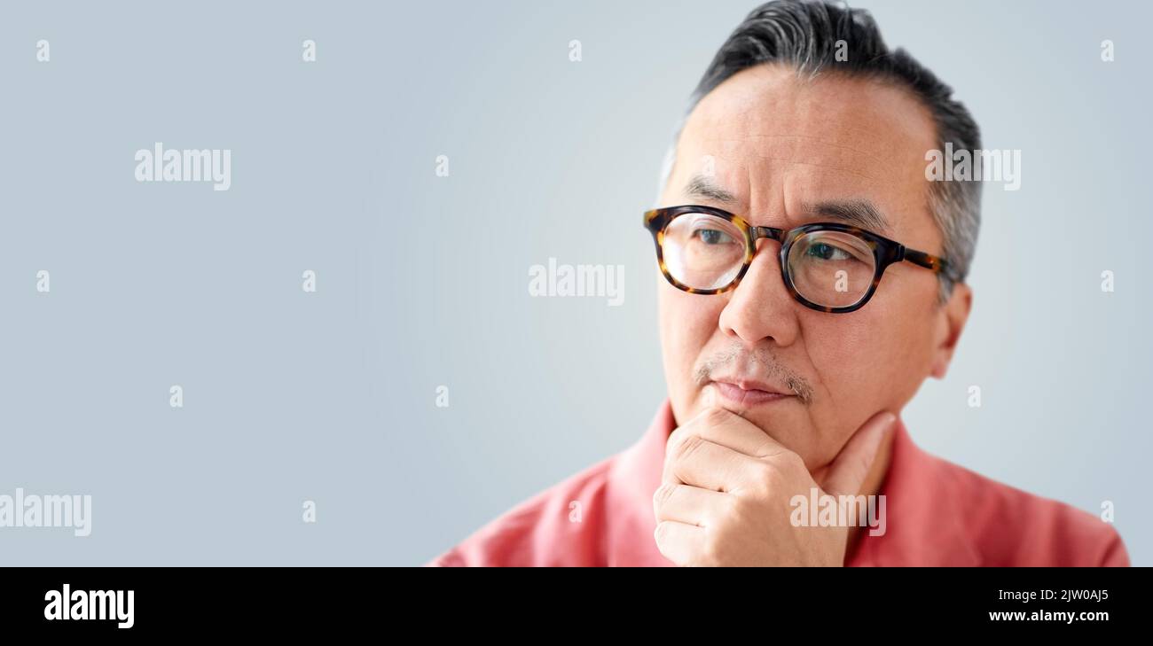 Asian man thinking hi-res stock photography and images - Alamy