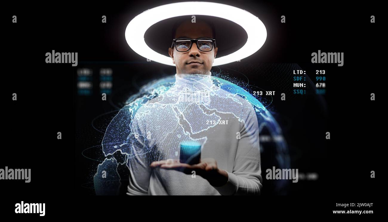 man in glasses with smart speaker under lamp Stock Photo - Alamy