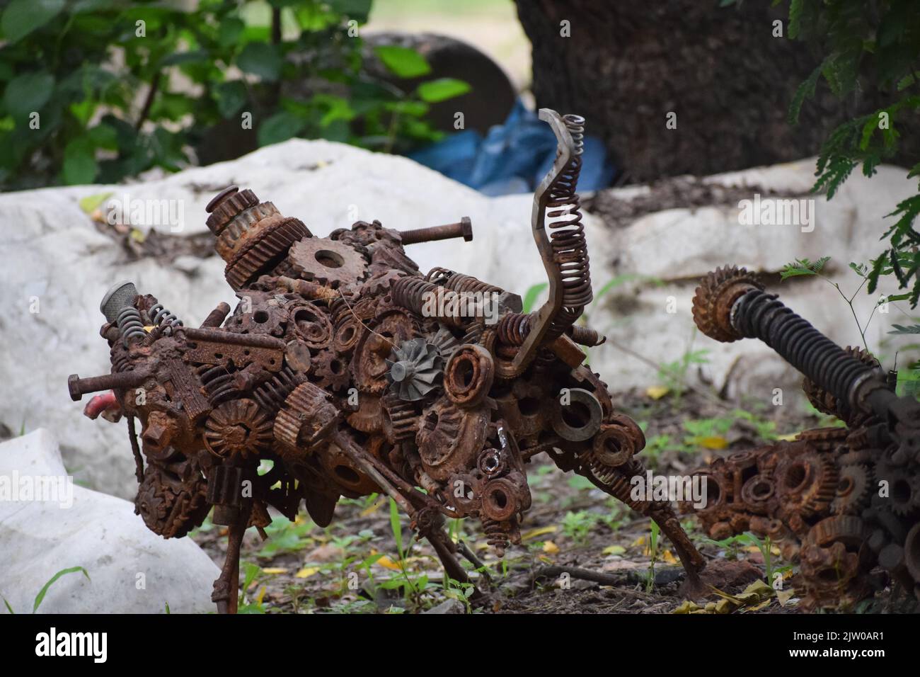 A sculptor of bull made from machine parts Stock Photo - Alamy