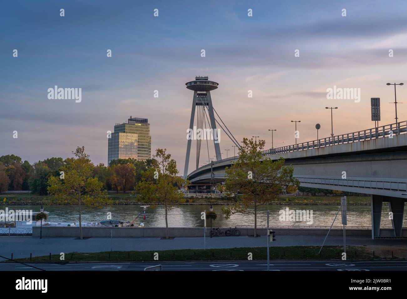 SNP Bridge and UFO Tower at sunset - Bratislava, Slovakia Stock Photo ...