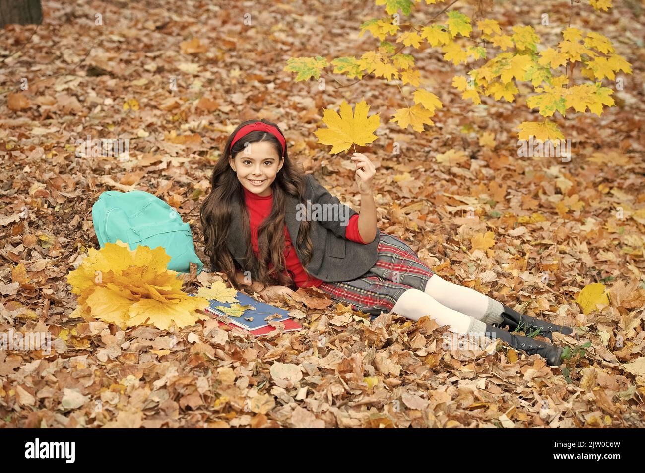 kid with notebook. fall season fashion. teen girl in school uniform ...
