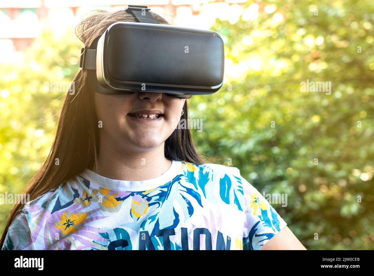 A closeup of a girl wearing a VR headset Stock Photo - Alamy