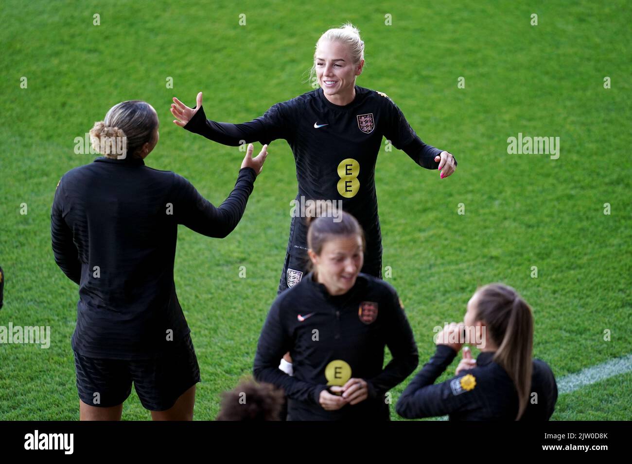 England's Alex Greenwood greets Lauren James, (left) during a training ...
