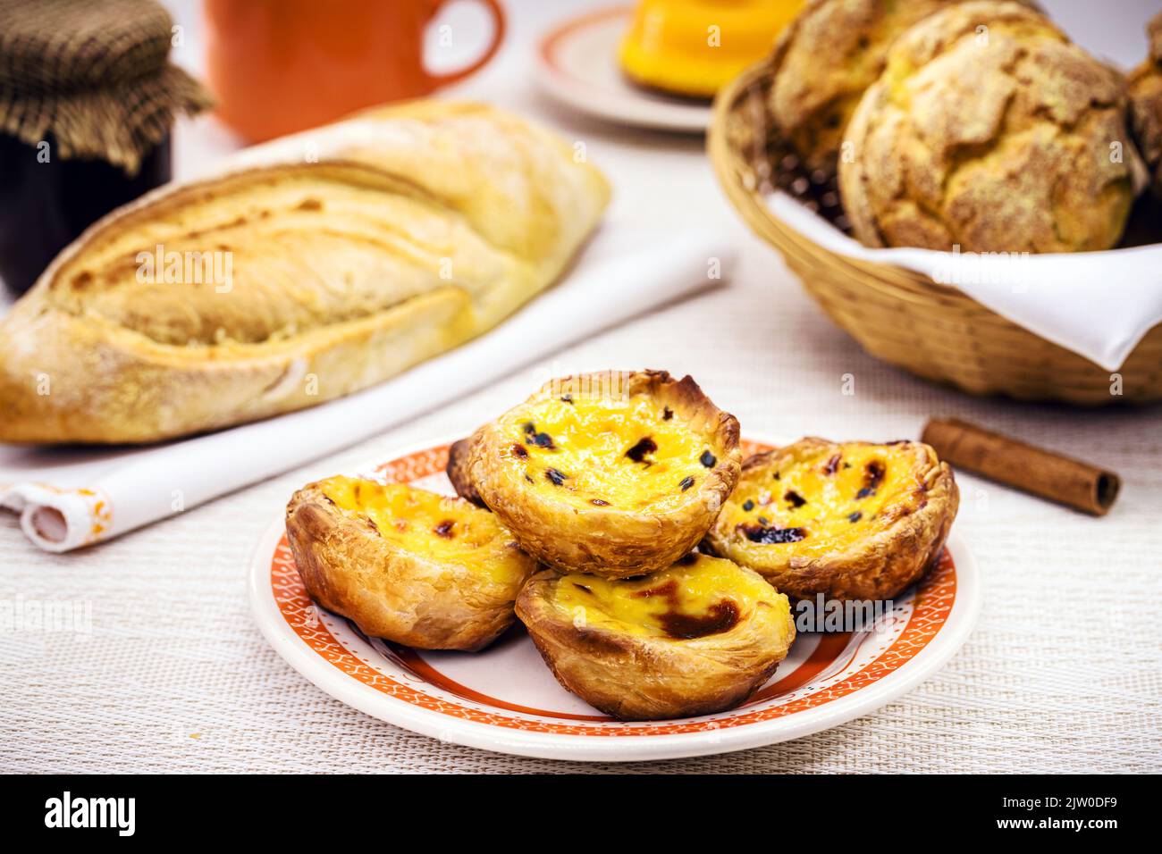 Traditional Portuguese dessert of pastel de nata, and bree de lis and ...