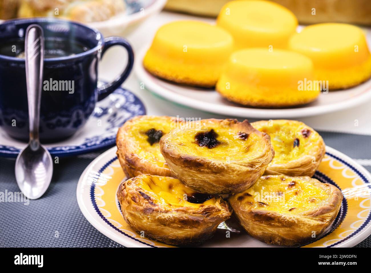 Traditional Portuguese dessert of pastel de nata, and bree de lis in ...