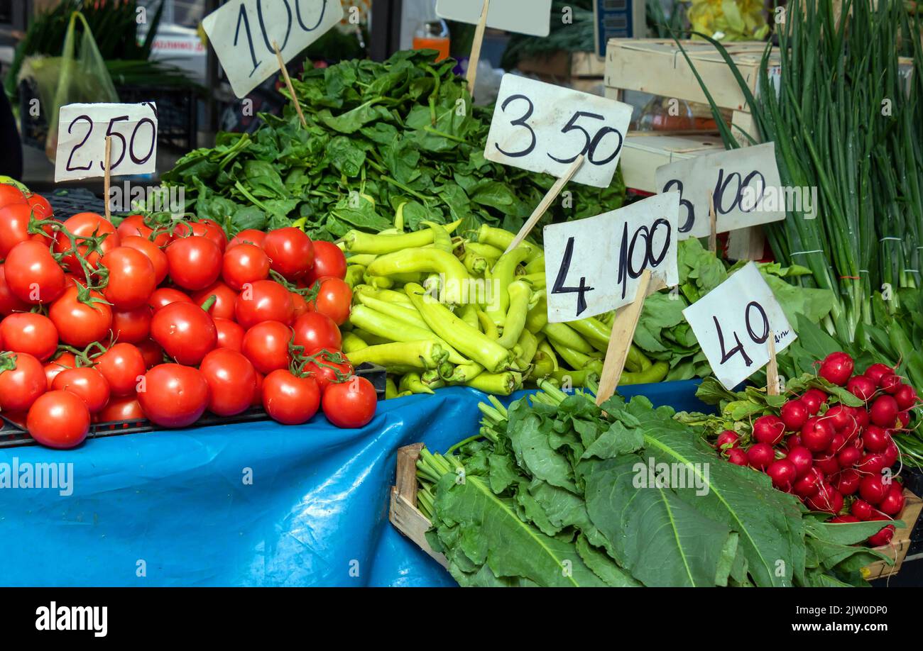 Fresh organic vegetables piles old on market stall Stock Photo - Alamy
