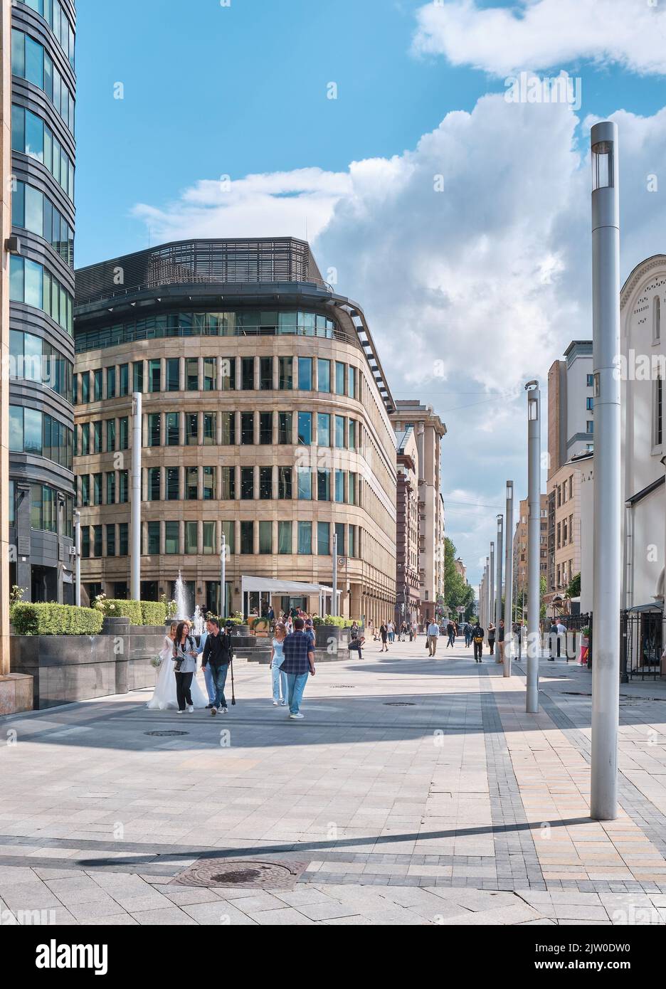 View of the pedestrian zone in front of the new modern business center ...
