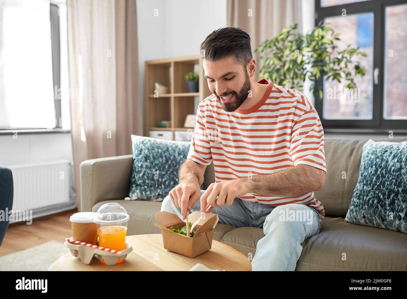 Man food eating hi-res stock photography and images - Alamy