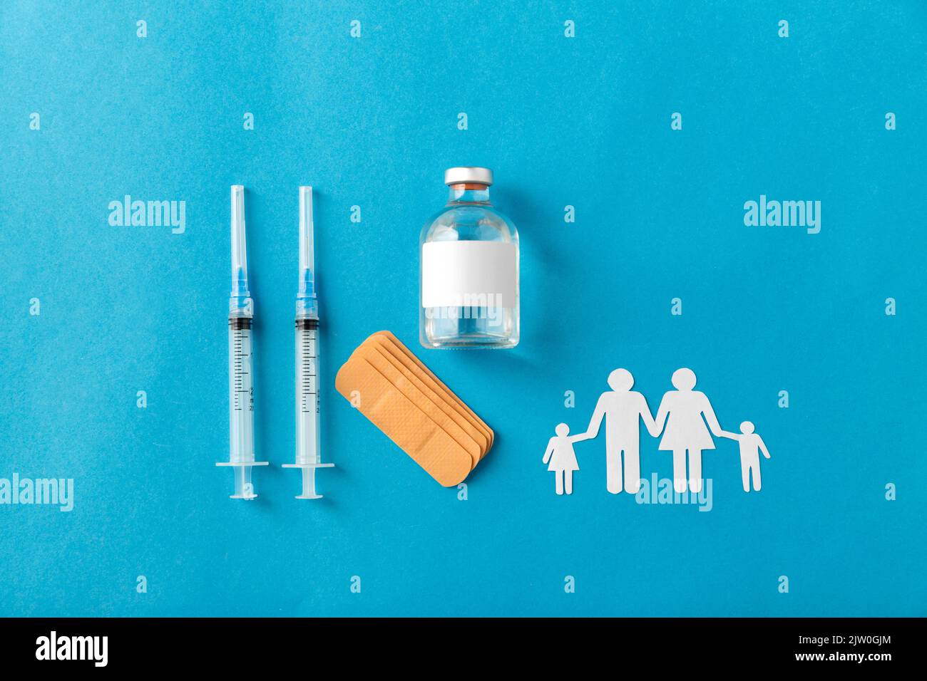 syringes and family pictogram on blue background Stock Photo - Alamy