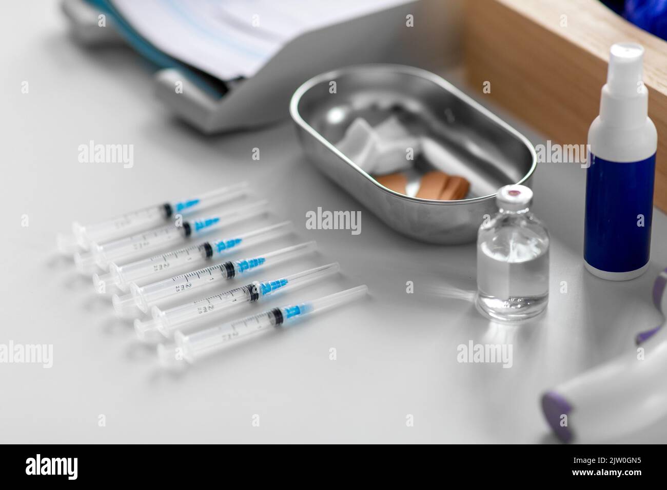 disposable syringes on table at hospital Stock Photo - Alamy