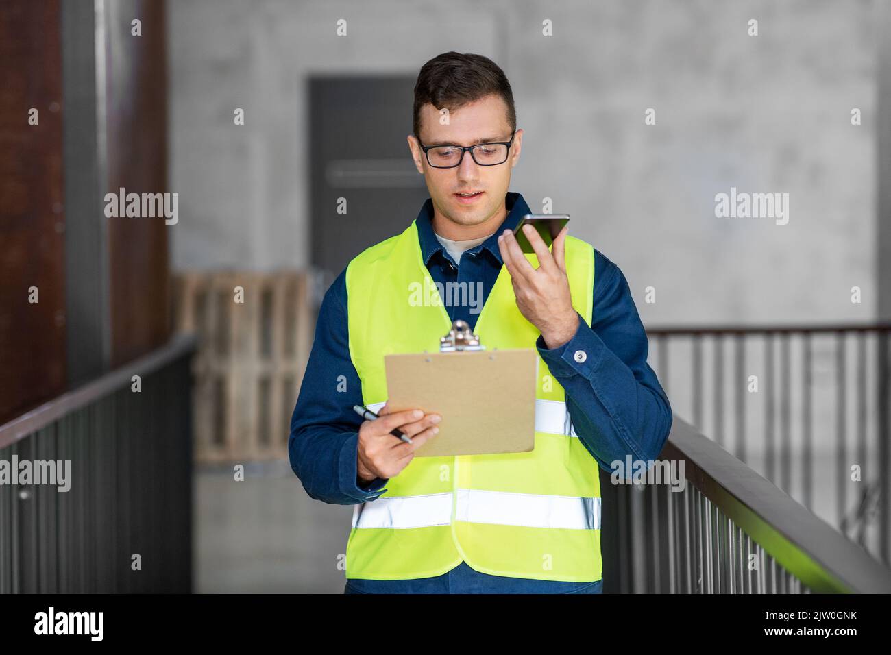 Male supervisor clipboard using hi-res stock photography and images - Alamy
