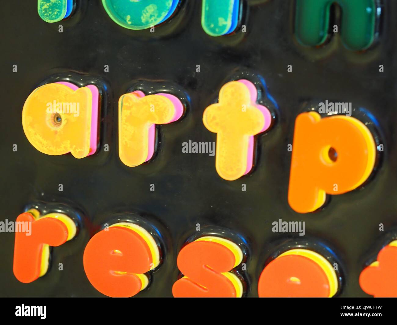 Colorful Words Against a Black Background Stock Photo - Alamy