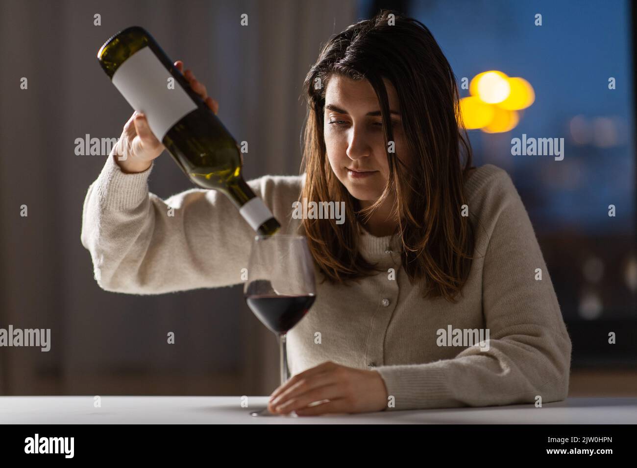 woman alcoholic drinking red wine at home Stock Photo - Alamy