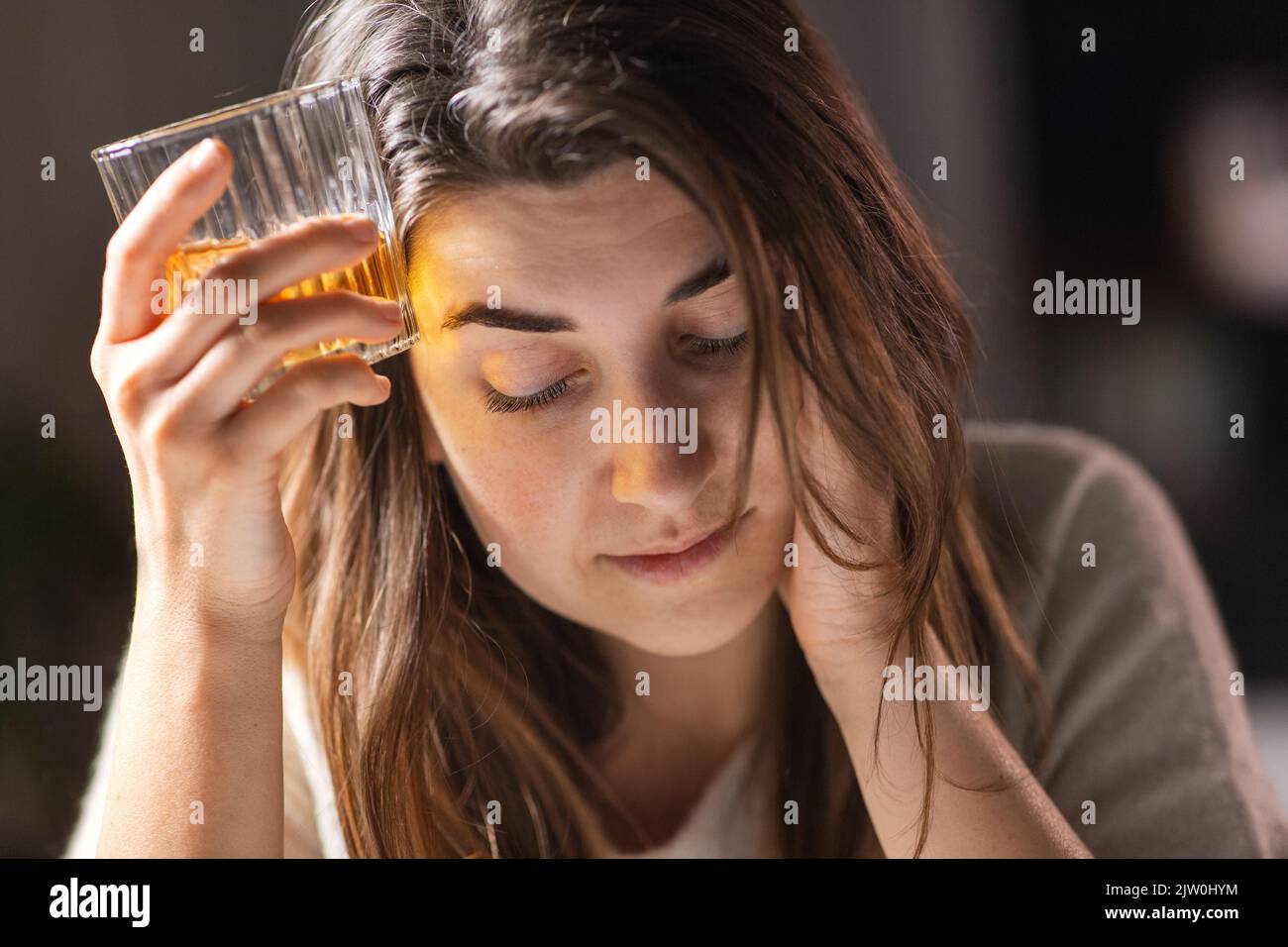 woman alcoholic drinking strong alcohol at home Stock Photo - Alamy