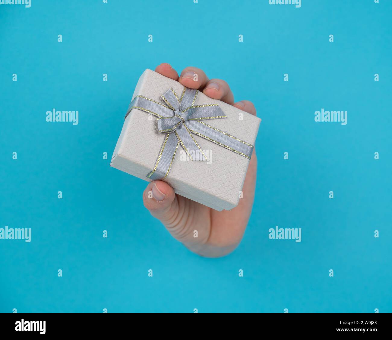 Hand sticking out of a cardboard box hi-res stock photography and ...