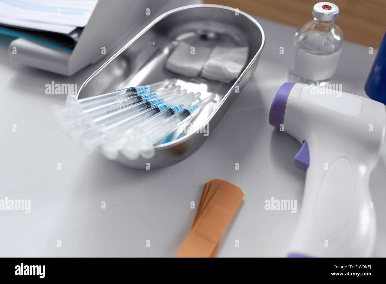 disposable syringes on table at hospital Stock Photo - Alamy