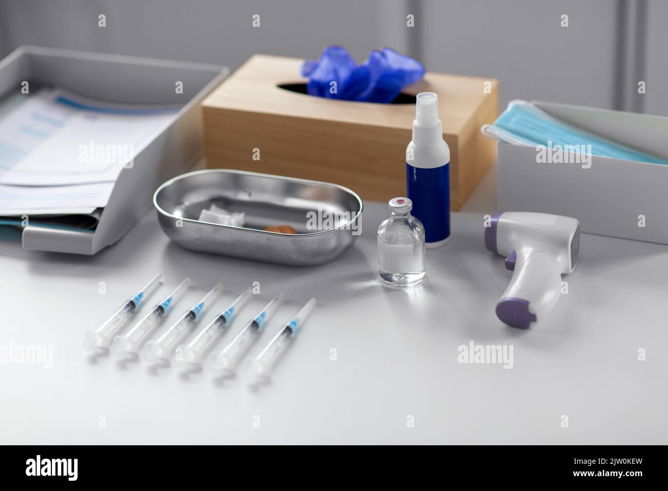 disposable syringes on table at hospital Stock Photo - Alamy