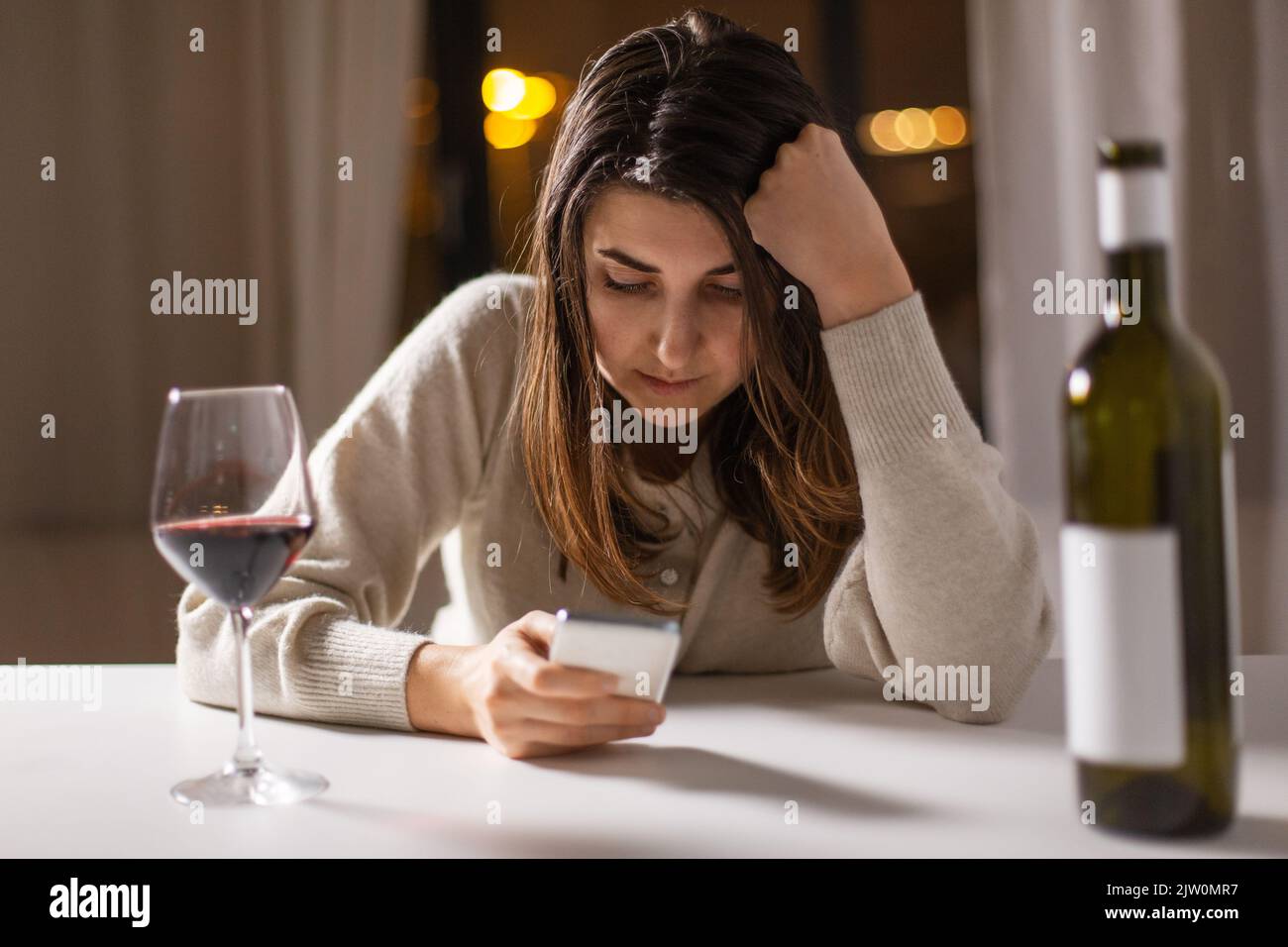 Drunk woman with wine bottle hi-res stock photography and images - Alamy