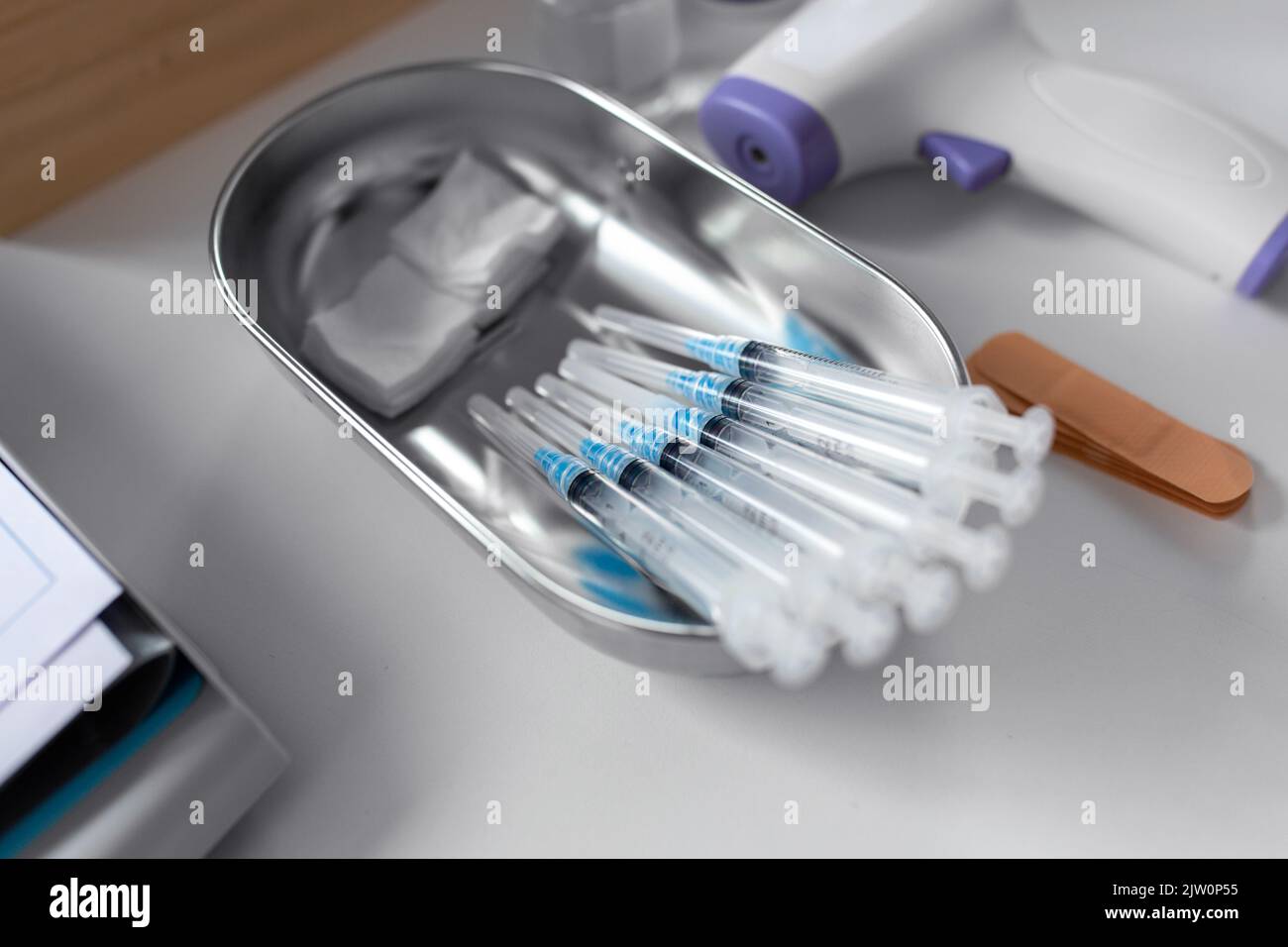 disposable syringes on table at hospital Stock Photo - Alamy