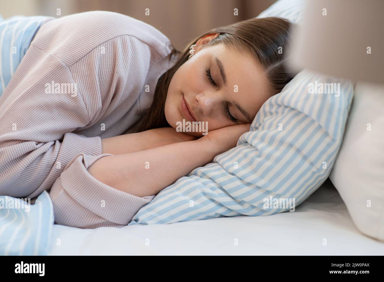 girl sleeping in bed at home in morning Stock Photo - Alamy