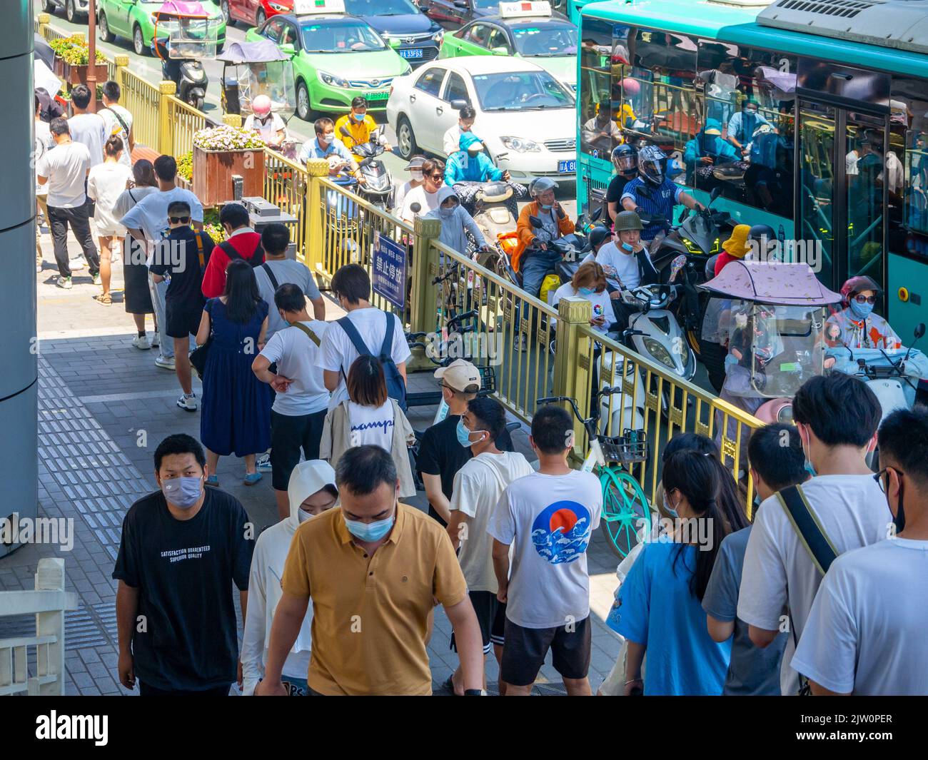 Chinese people lining up for a Covid-19 test in the downtown district ...