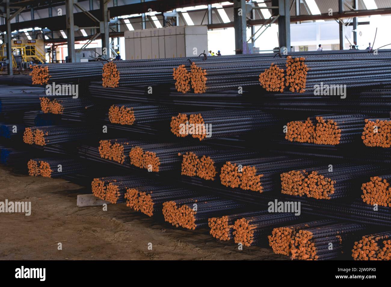 Piles of steel rods on the shelves at a manufacturing company in Africa ...