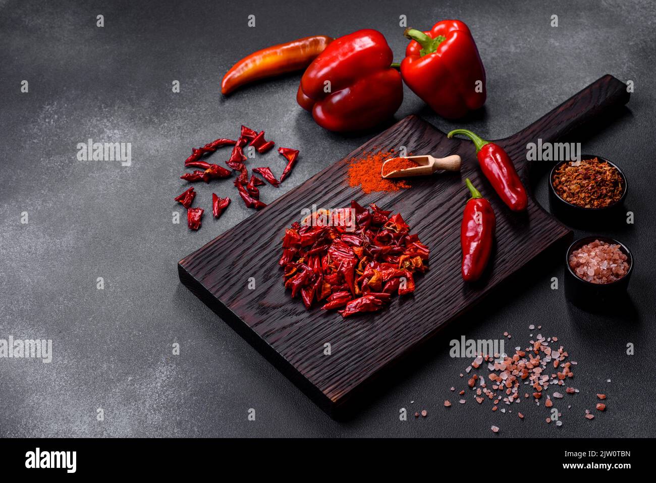Pieces of dried paprika, preparation of powder spice for various dishes ...