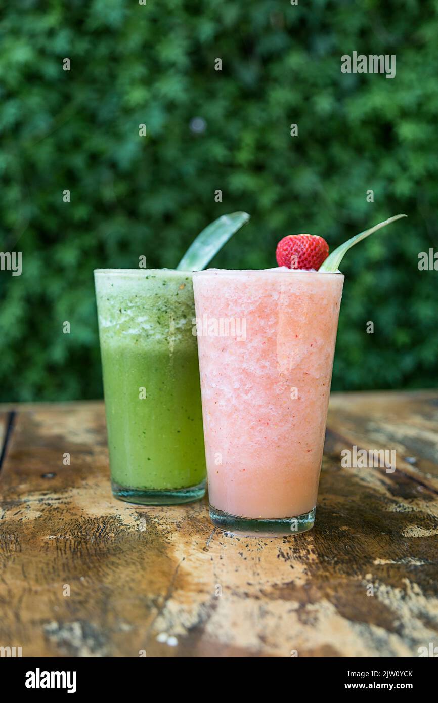 Natural strawberry shake and green shake. Nutritious and healthy. Vegan ...