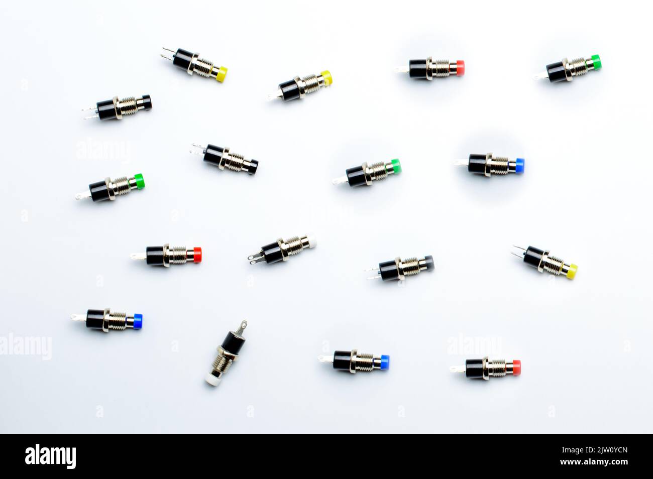 Top view set of a colorful electronic buttons on a white background ...