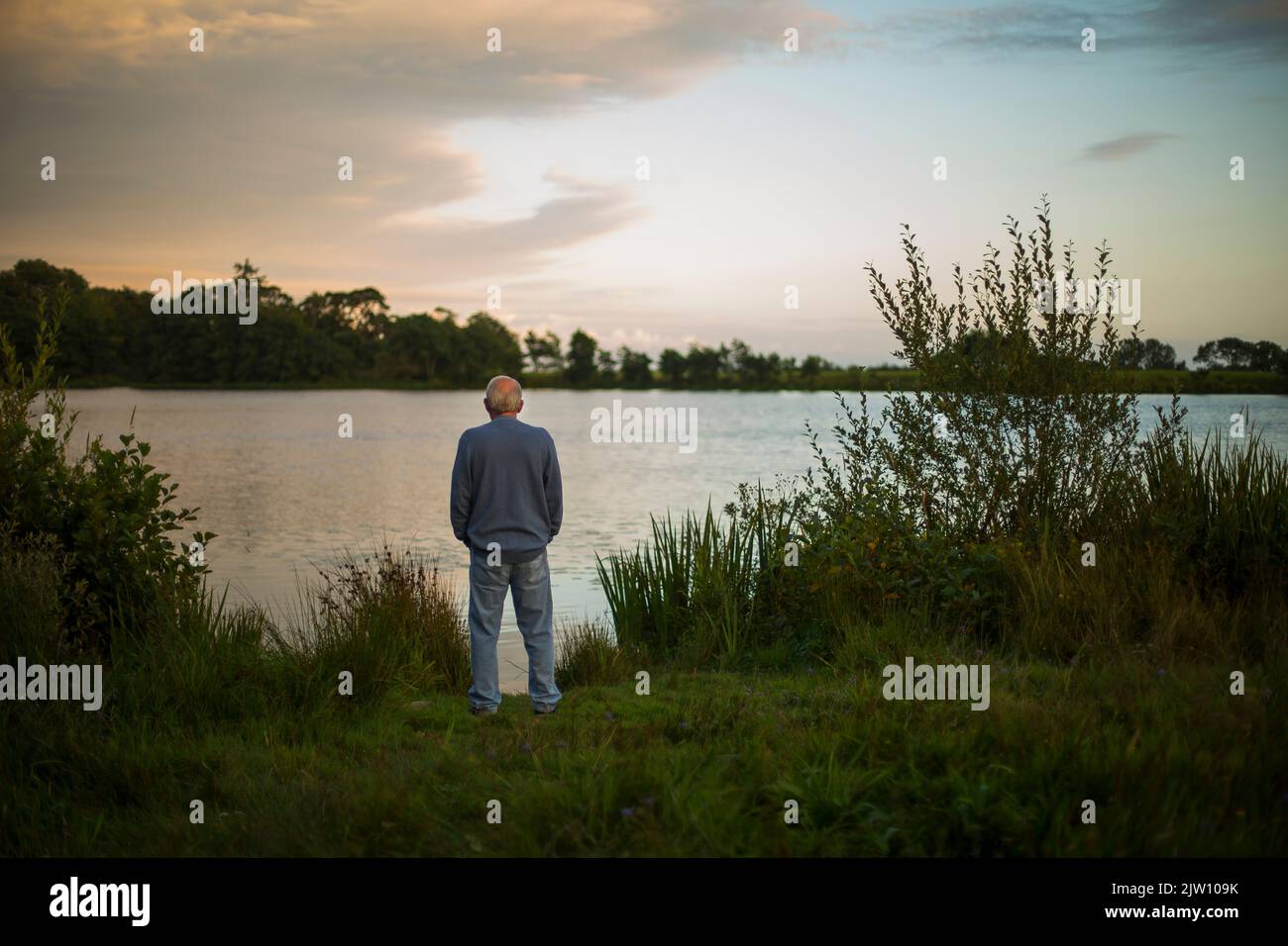 Old man stands hi-res stock photography and images - Alamy
