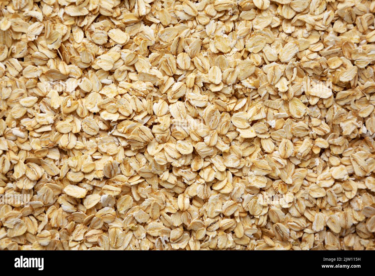 Dry Organic Rolled Oats Background Stock Photo - Alamy