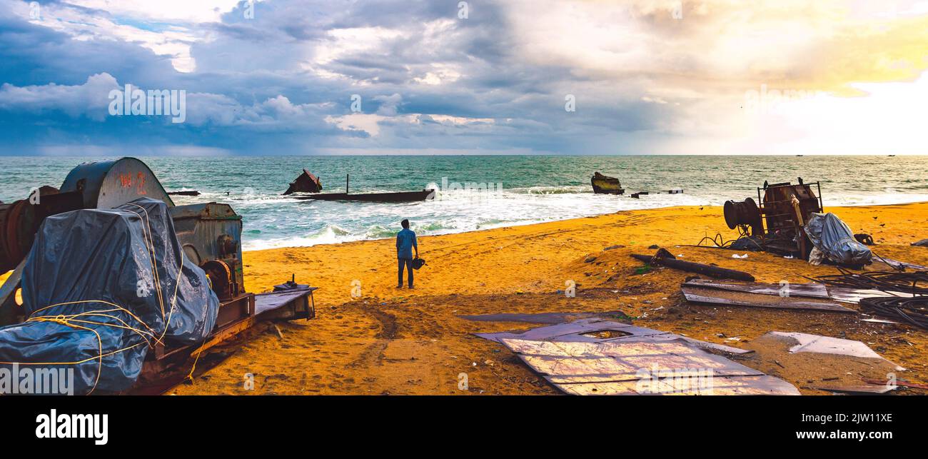 Scraps of metal on a beach Stock Photo - Alamy