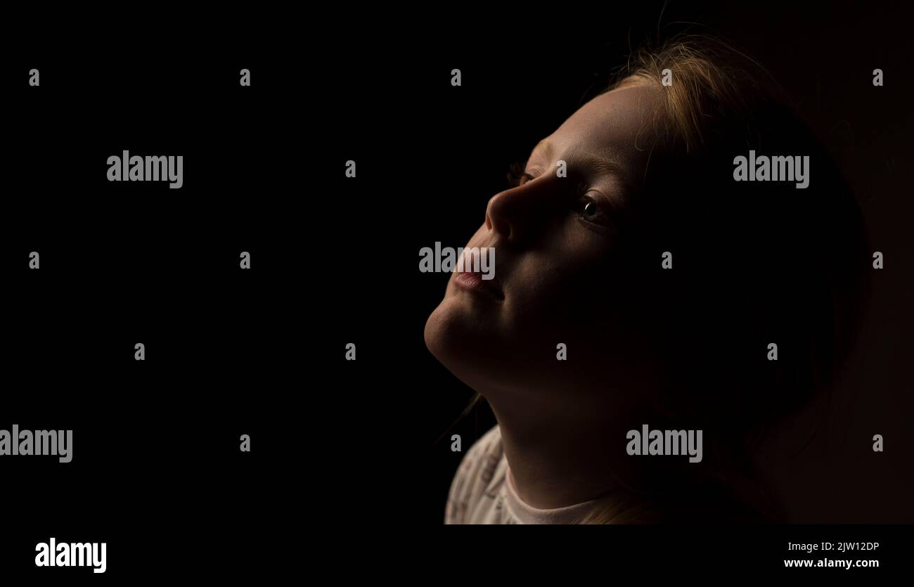 Sad looking child hi-res stock photography and images - Alamy