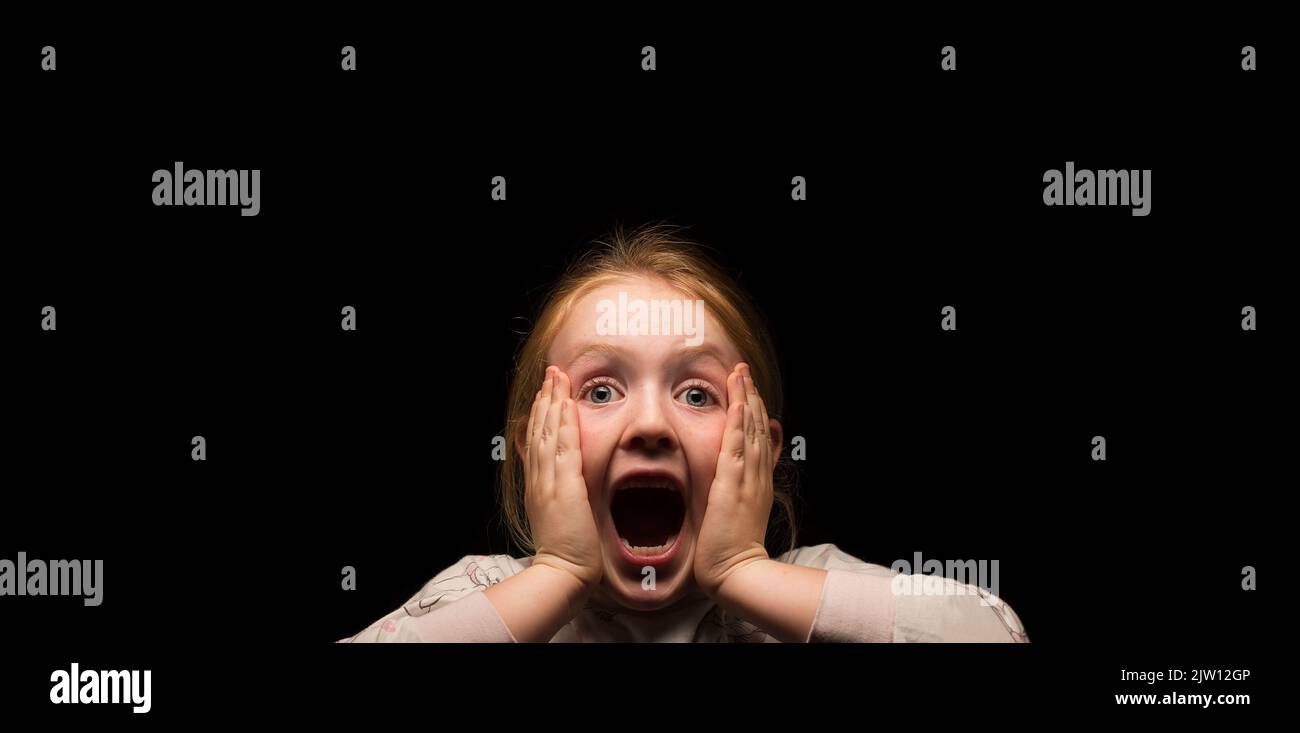 Young Caucasian female with a look of shock on her face Stock Photo - Alamy