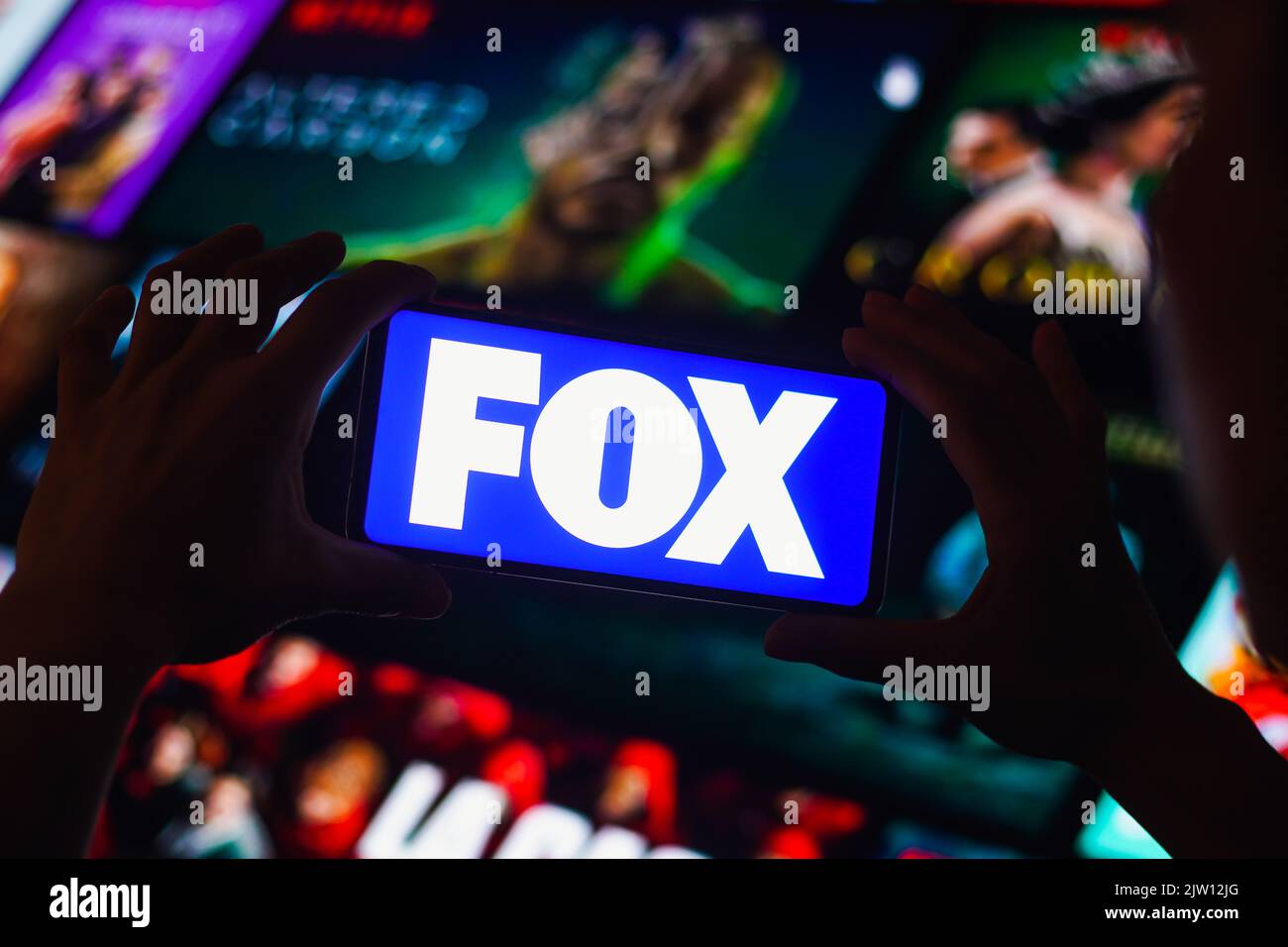 In this photo illustration, the Fox Corporation logo is displayed on a ...