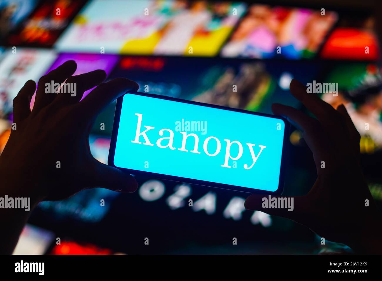 In this photo illustration, the Kanopy logo is displayed on a ...