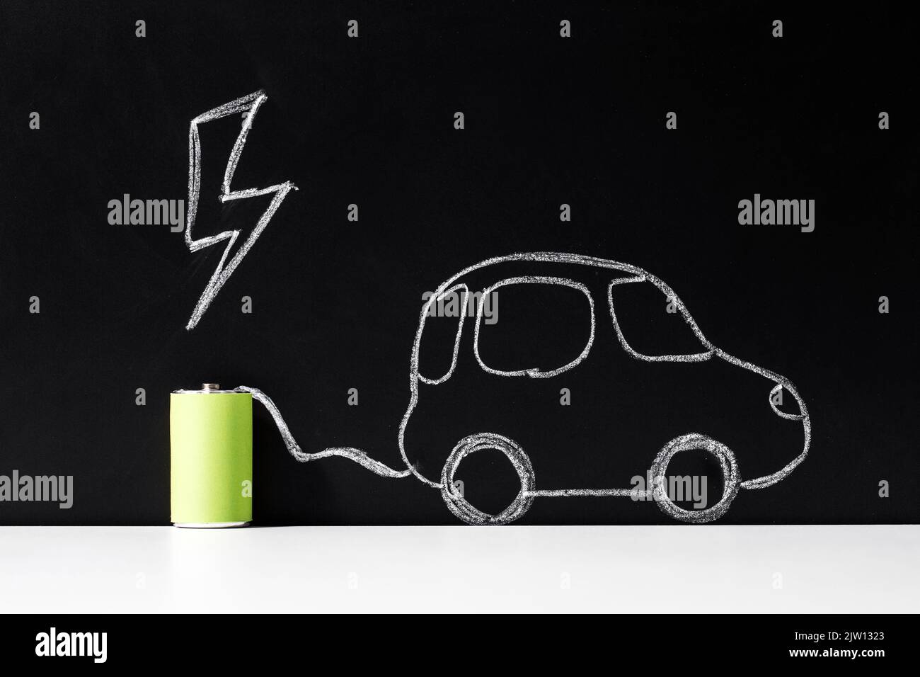 electric car charging from battery over black Stock Photo - Alamy