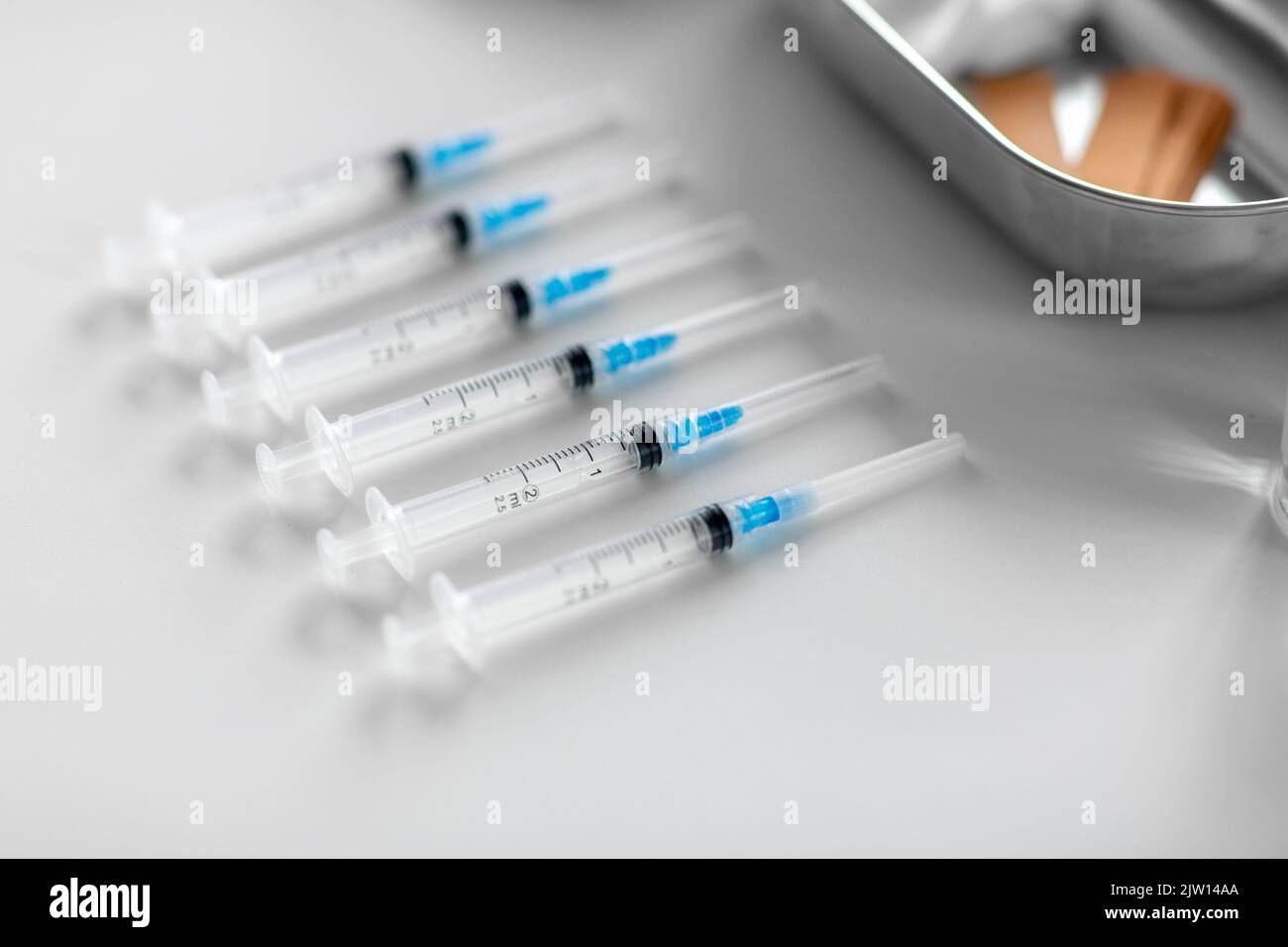 disposable syringes on table at hospital Stock Photo - Alamy