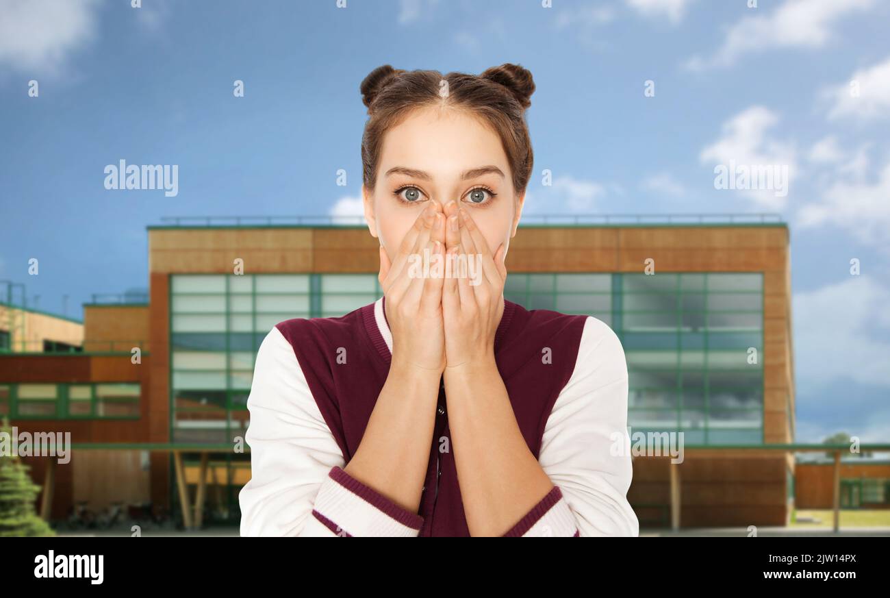 scared teenage girl on school background Stock Photo - Alamy