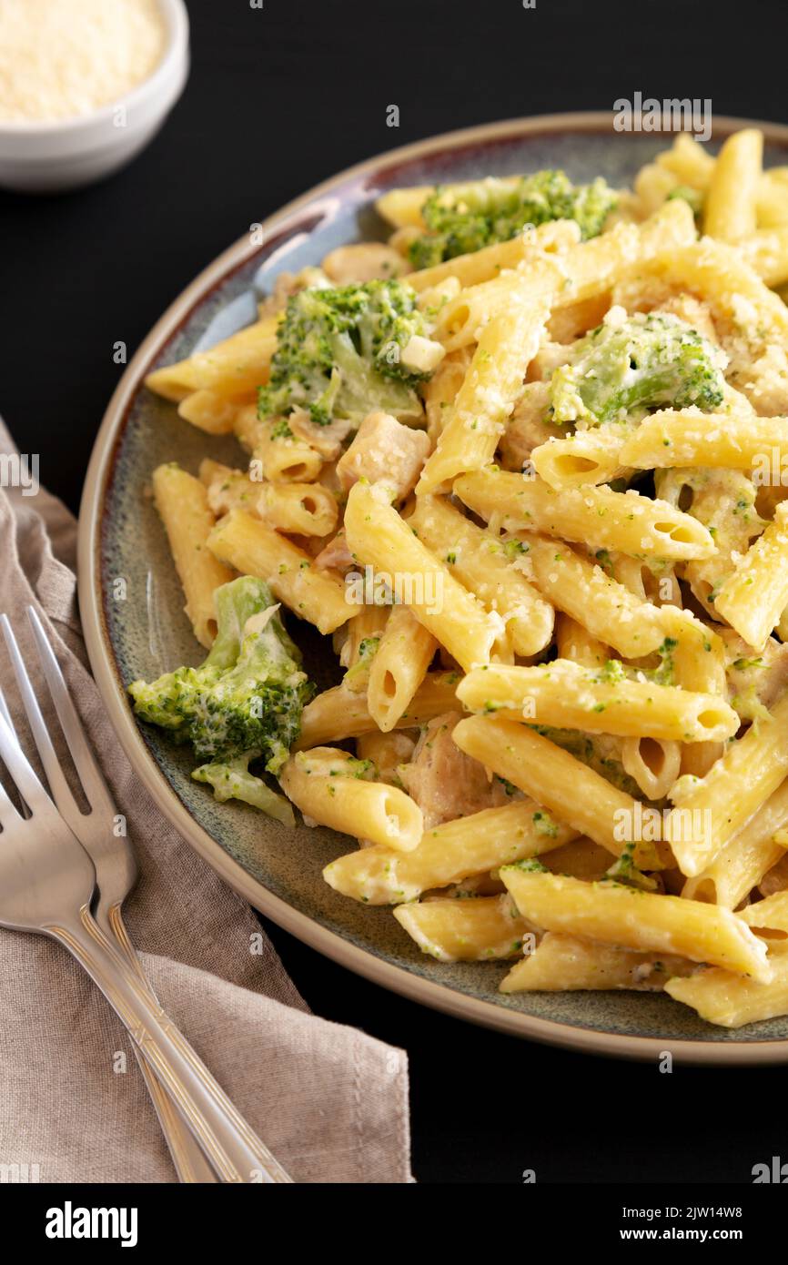 Homemade Penne Alfredo Pasta with Chicken and Broccoli on a Plate on a ...