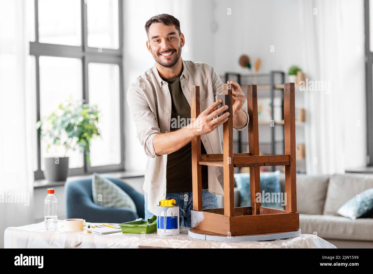 Man sanding hi-res stock photography and images - Alamy