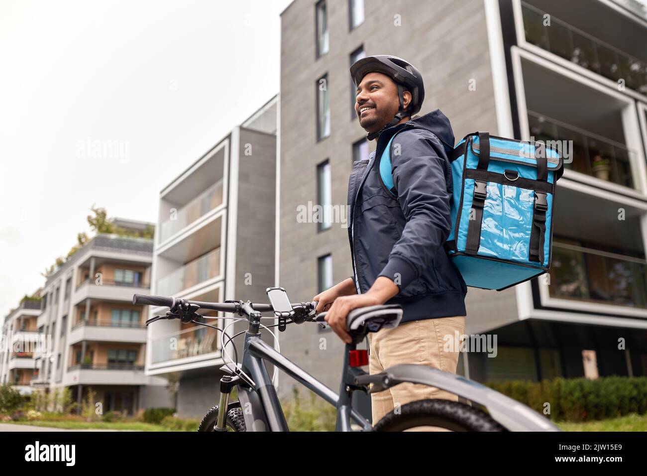 Indian bike delivery boy hi-res stock photography and images - Alamy