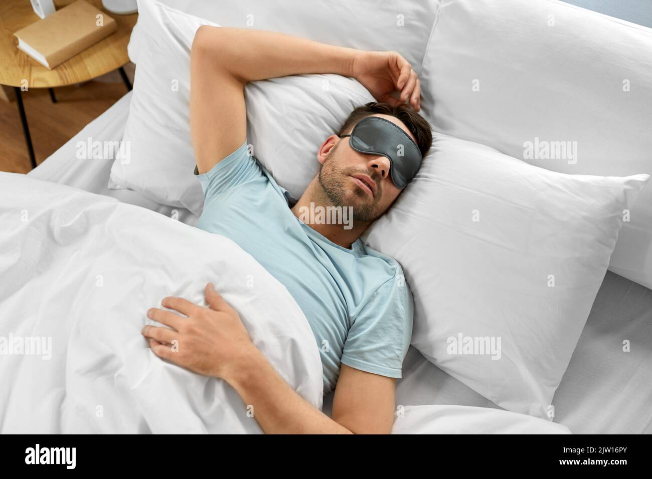Man in sleeping mask hi-res stock photography and images - Alamy